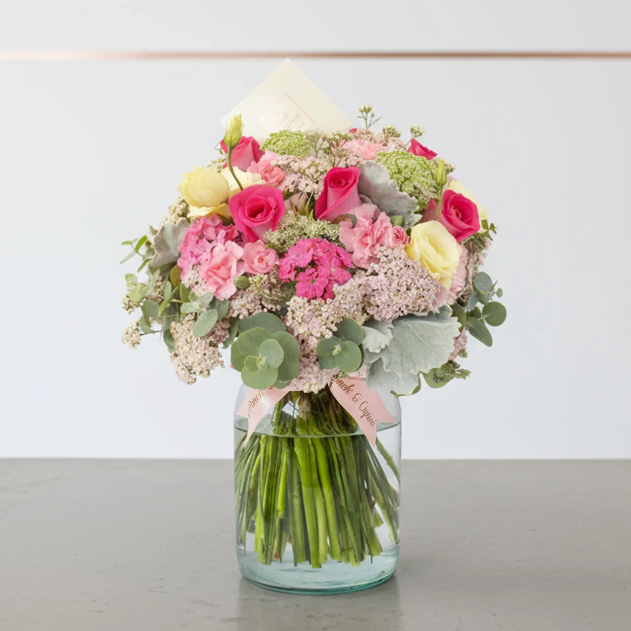 Floral arrangement of roses, lisianthus, and carnations | Send Flowers ...